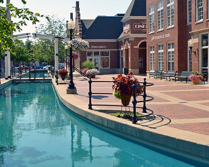 Pella's canal-side walkway looks like it was plucked straight from Amsterdam. Those flower baskets aren't messing around!