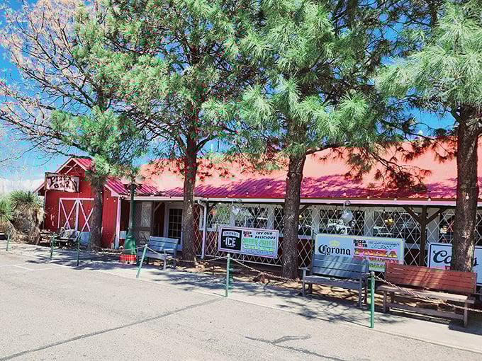 The Pizza Barn's bright red exterior isn't just eye-catching&mdash;it's a beacon of hope for hungry travelers on the New Mexico highway.