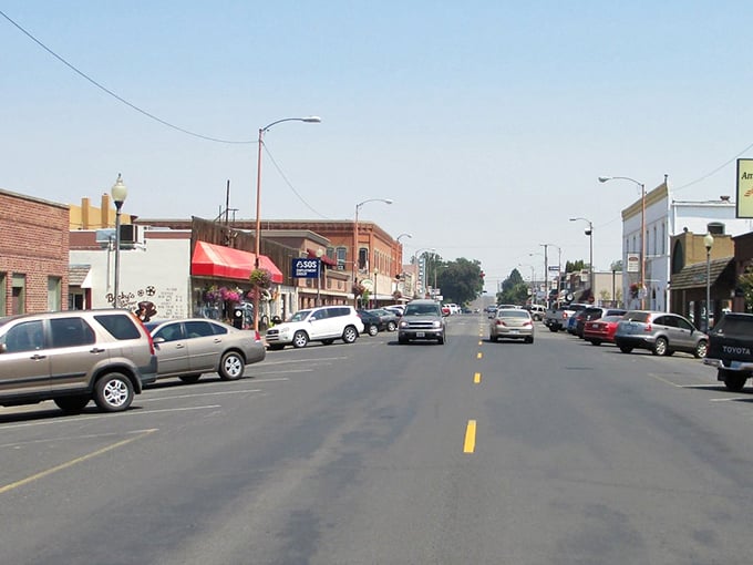 Downtown Prosser beckons with that perfect small-town vibe! Classic brick storefronts and angled parking—where finding a spot is never a blood sport.