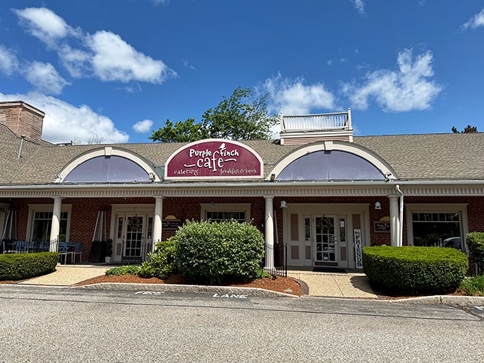 Purple Finch Caf&eacute;'s brick exterior whispers "comfort food lives here" louder than any neon sign ever could.