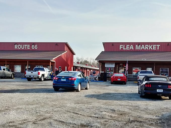 The iconic red barns of Route 66 Flea Market stand ready for treasure hunters. Classic Americana at its bargain-hunting best!