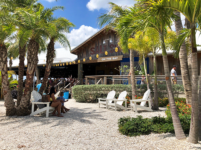 Salt Shack's rustic charm welcomes you with swaying palms and white Adirondack chairs. Paradise found with your toes in the sand and seafood on your plate.