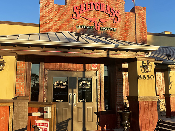 The iconic brick facade of Saltgrass Steak House beckons like an old friend promising a night of carnivorous delights.