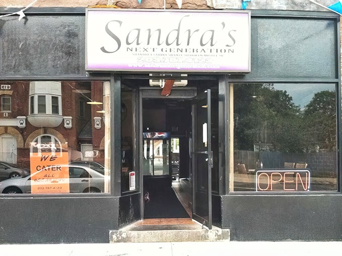 Sandra's Next Generation storefront beckons with a simple sign but promises extraordinary soul food treasures waiting just beyond those doors.