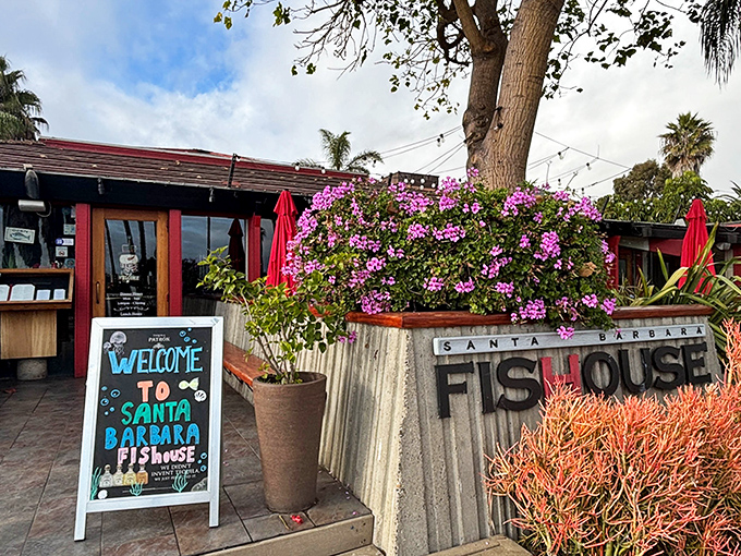 The Santa Barbara FisHouse welcomes you with colorful flowers and coastal charm. Like finding a seafood oasis where the palm trees meet the Pacific.