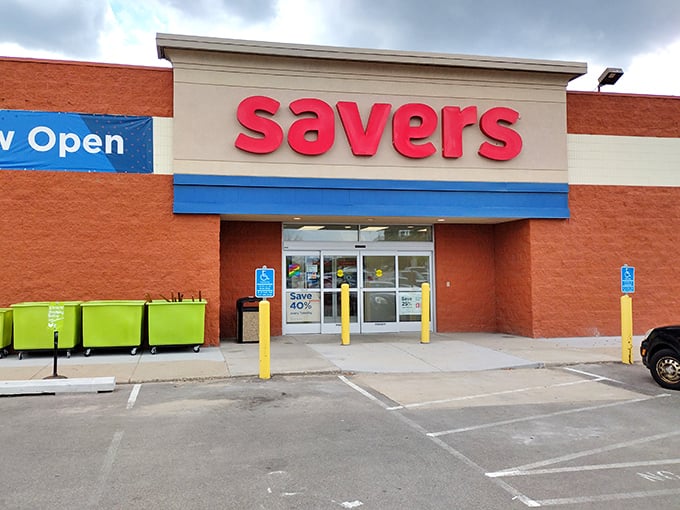 The bright red Savers sign beckons like a lighthouse for bargain hunters. Step inside and let the treasure hunt begin!