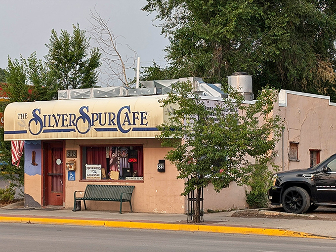 The Silver Spur Cafe's adobe-style charm beckons like a Western movie set come to life. That yellow sign practically shouts "breakfast is served!"
