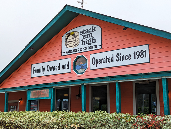 Stack'em High's coral-colored charm has been a beacon for pancake lovers since 1981. Like a lighthouse for hungry souls seeking breakfast bliss.