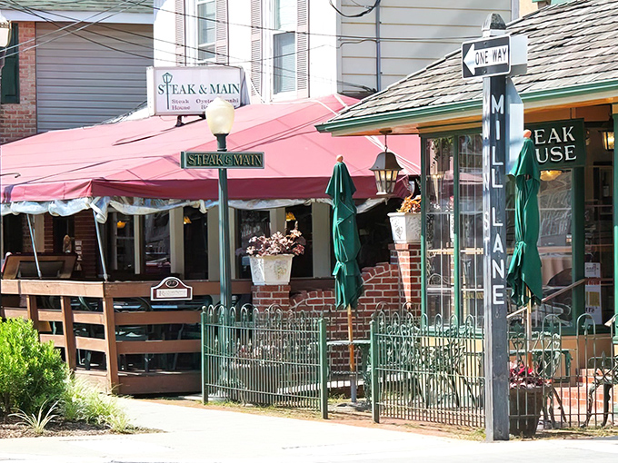 That charming brick patio with the red awning is calling your name for a perfect steak dinner tonight.