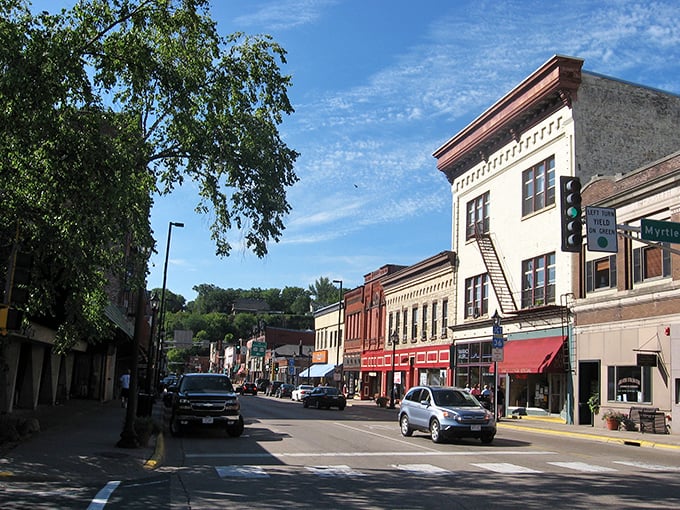 Historic charm meets river views in Stillwater's postcard-perfect downtown, where brick buildings tell stories of Minnesota's logging past.