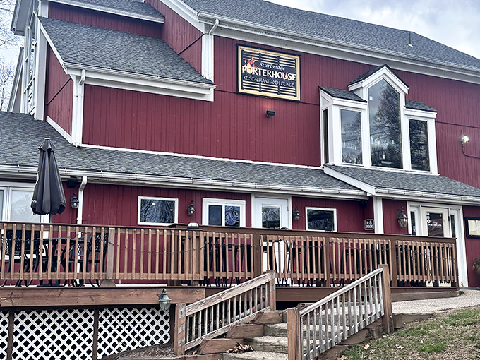 The Sturbridge Porterhouse's classic red barn exterior promises comfort and sizzling steaks &ndash; New England charm with carnivorous benefits!