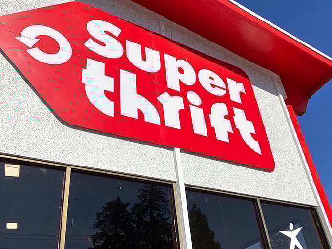 The iconic red SuperThrift sign beckons like a lighthouse for bargain hunters navigating the sea of retail.