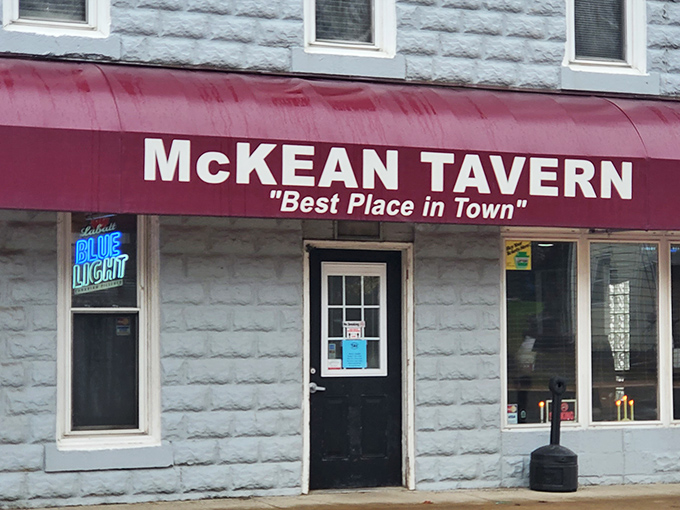 That iconic red awning boldly proclaiming "Best Place in Town" isn't just small-town bravado—it's a promise McKean Tavern delivers on with every crispy wing.
