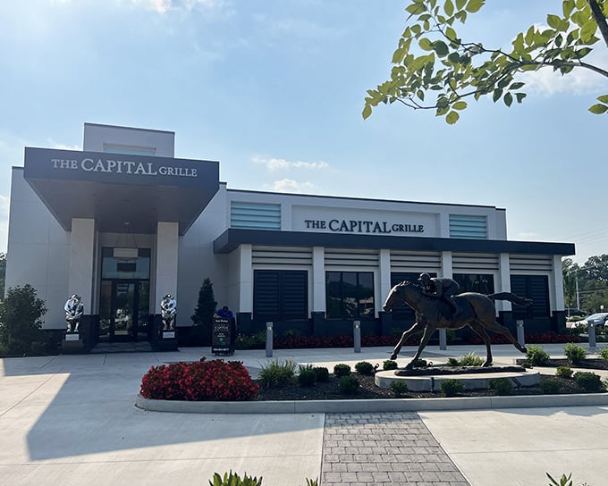 The Capital Grille's elegant exterior welcomes you with a racing horse statue – a perfect Kentucky greeting before the steak main event.