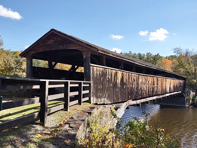 The weathered wooden sentinel stands proudly over the Wallkill River, its timbers telling tales of centuries gone by.