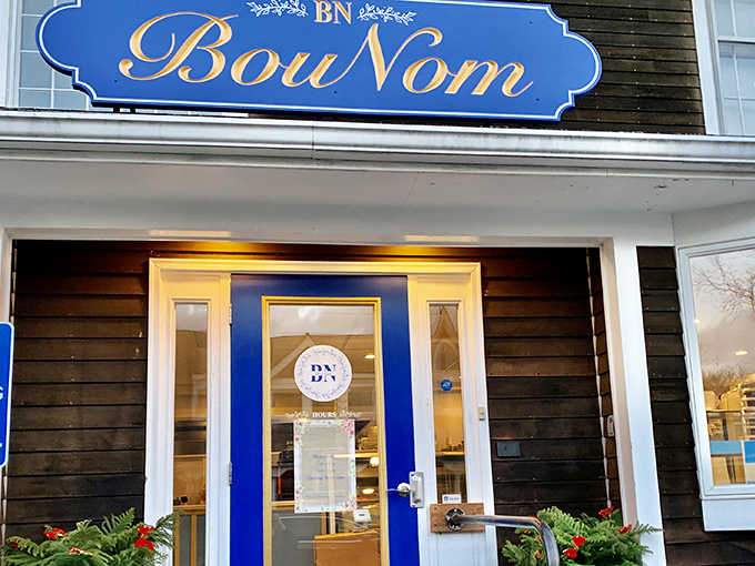 The iconic blue and gold signage of BouNom beckons like a beacon of buttery hope on Avon's main drag.