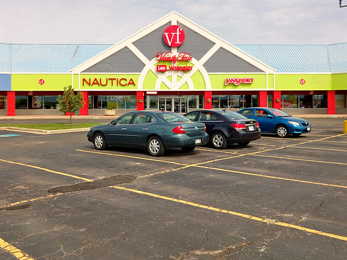 The Outlet Shoppes at Oshkosh: That bright red and green entrance isn't just eye-catching&mdash;it's like a holiday for your wallet every day of the year!