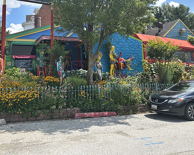 The PaperMoon Diner's exterior is a kaleidoscope of color and whimsy &ndash; like Willy Wonka opened a restaurant with Salvador Dali.
