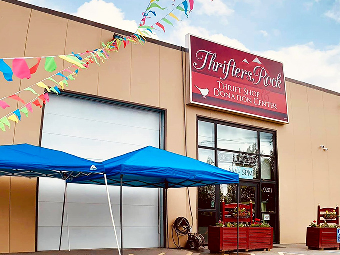 Thrifters Rock's colorful flags welcome treasure hunters like a festive carnival of second-hand wonders. Bargain paradise awaits!