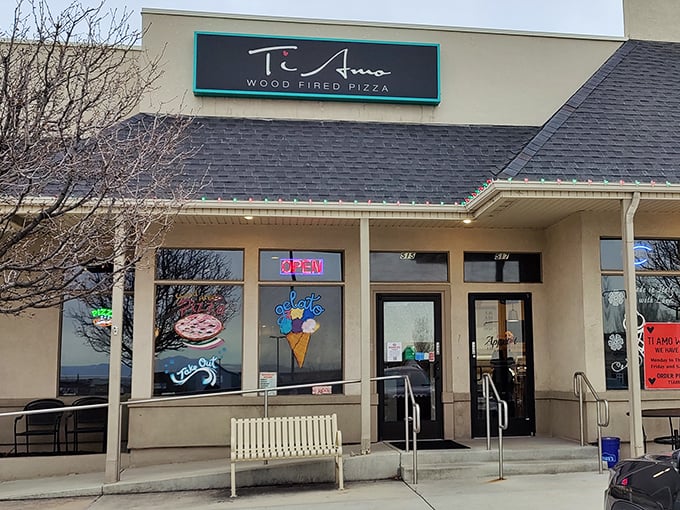 Ti Amo's unassuming storefront hides pizza greatness within. That neon "OPEN" sign might as well say "PIZZA PARADISE."