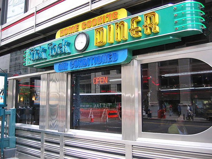 The neon glow of Tick Tock Diner beckons like a time machine to the golden age of breakfast. Classic Americana served 24/7!
