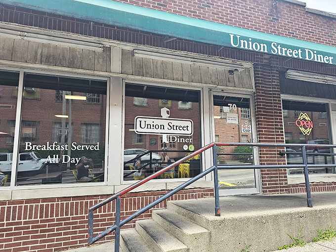 The Union Street Diner's brick facade and green awning - where "Breakfast Served All Day" isn't just a sign, it's a promise.
