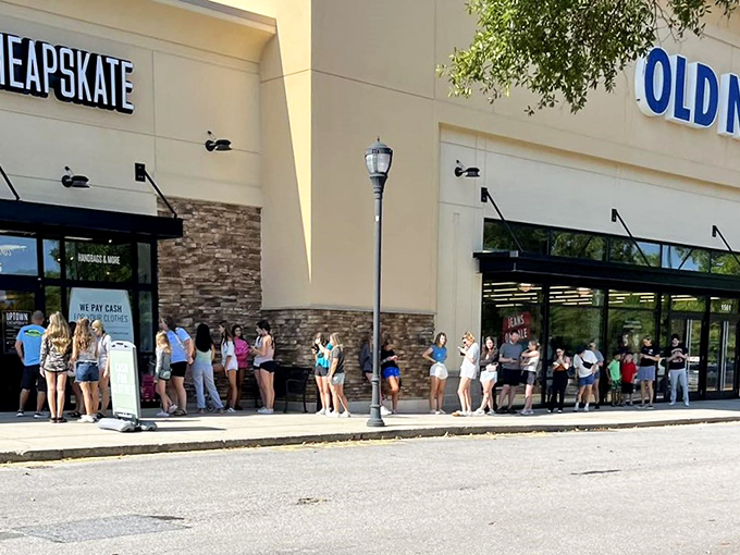 Look at that line! Uptown Cheapskate Apex draws crowds eager to score designer deals without the designer price tags.