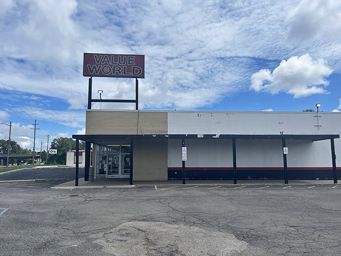 That classic red and white sign beckons bargain hunters like a lighthouse guides ships to shore. 