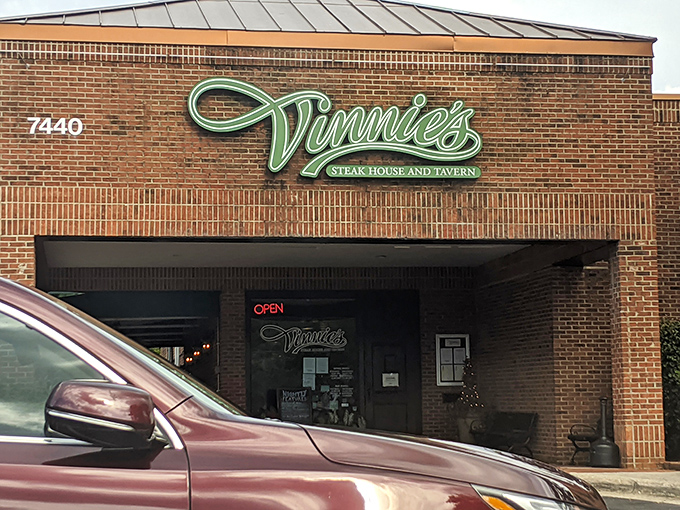 That brick facade whispers "serious steak business" - sometimes the best treasures hide behind humble exteriors. 