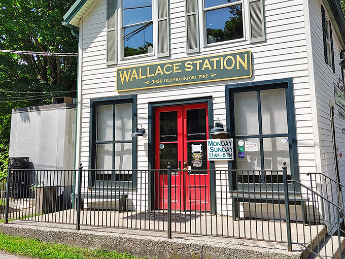 The charming white exterior of Wallace Station with its iconic red doors beckons hungry travelers like a country oasis.