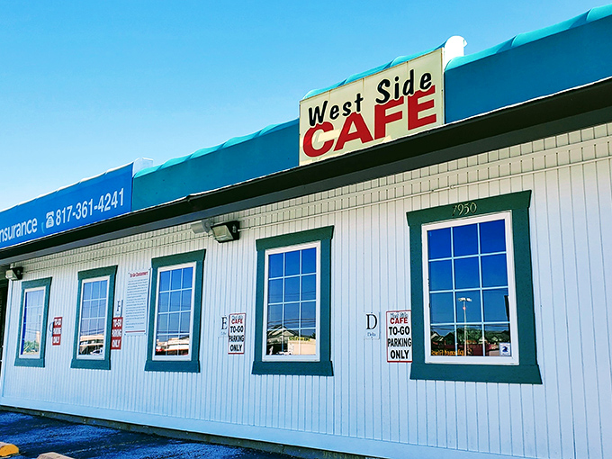 West Side Cafe's iconic sign promises comfort food that'll make you forget all your troubles. Simple exterior, extraordinary flavors inside!