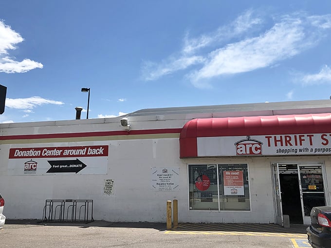 The iconic red awning of arc Thrift Store welcomes bargain hunters. Shopping with a purpose never looked so inviting!