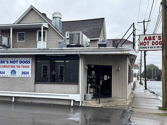 Rain or shine, Abe's Hot Dogs keeps the grills hot and the locals happy with their century-old hot dog magic.