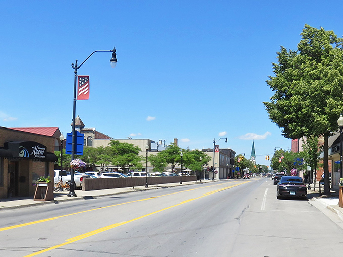 Main Street Alpena, where American flags flutter in the breeze and you're never more than a minute away from a friendly conversation.