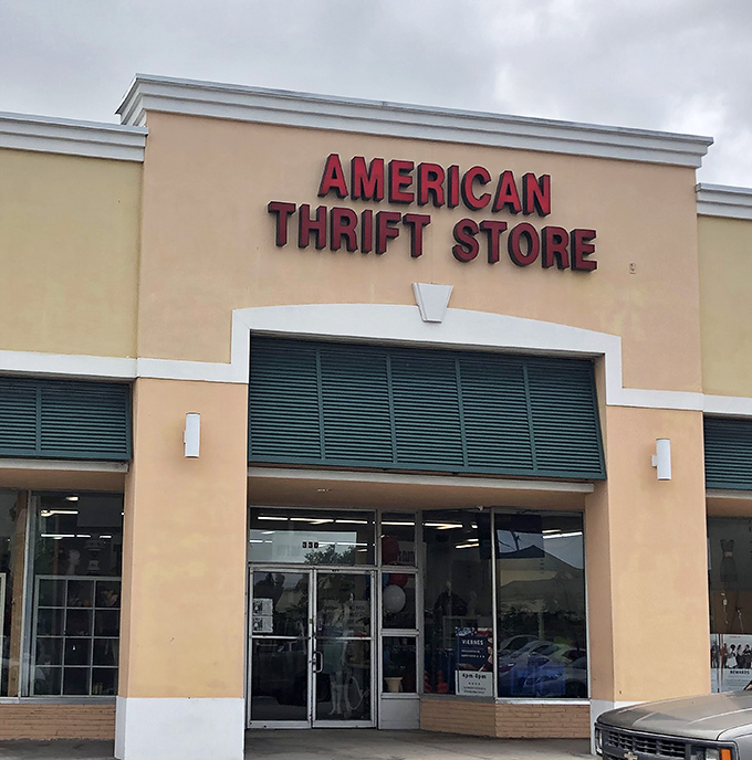 Cloudy day, bright prospects! American Thrift Store's facade promises adventures in secondhand shopping without breaking the bank.