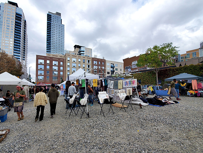 Treasure hunters browse under open skies at this Williamsburg market, where urban creativity meets vintage charm.