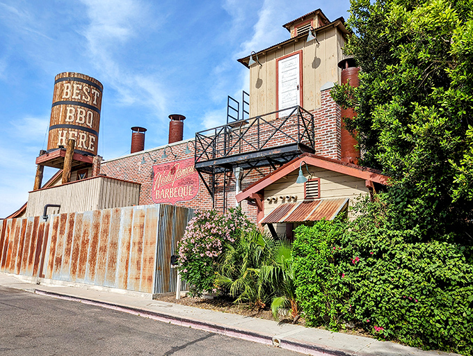 "Best BBQ Here" isn't just a bold claim on that rustic water tower&mdash;it's a smoky promise this place delivers on.