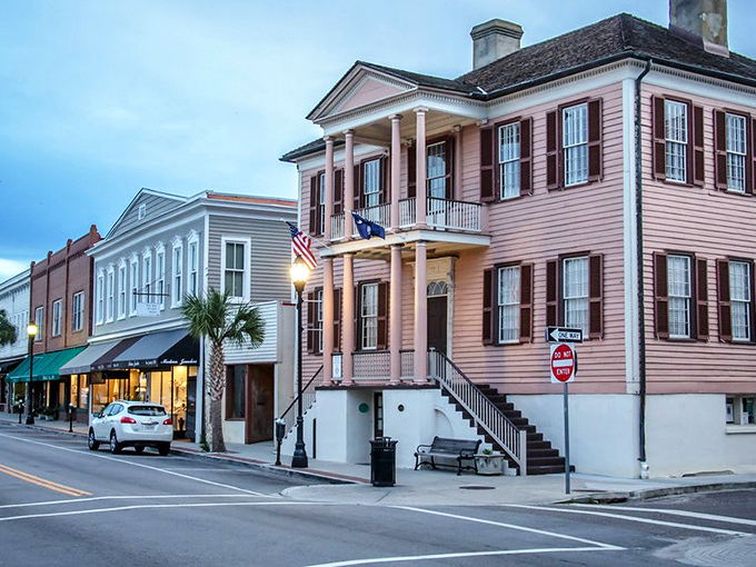 Pink-hued historic buildings stand sentinel along Beaufort's streets, whispering stories from three centuries of coastal living.