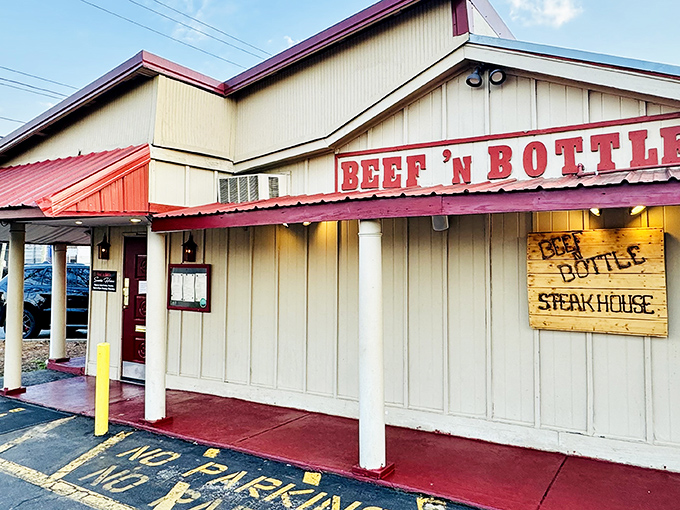 Beef 'N Bottle's classic red awning signals to steak lovers: "Your search for perfection ends here."