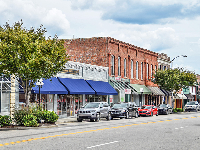 Main Street magic! These brick buildings have seen more history than a Ken Burns documentary, yet they're still charming shoppers with their timeless appeal.