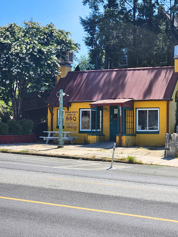 This little yellow house might look like it belongs in a fairy tale, but the BBQ inside is the real happily ever after.