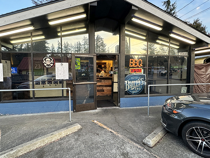 Step inside this unassuming blue haven where barbecue dreams come true. Those neon "OPEN" signs never lie about good food!