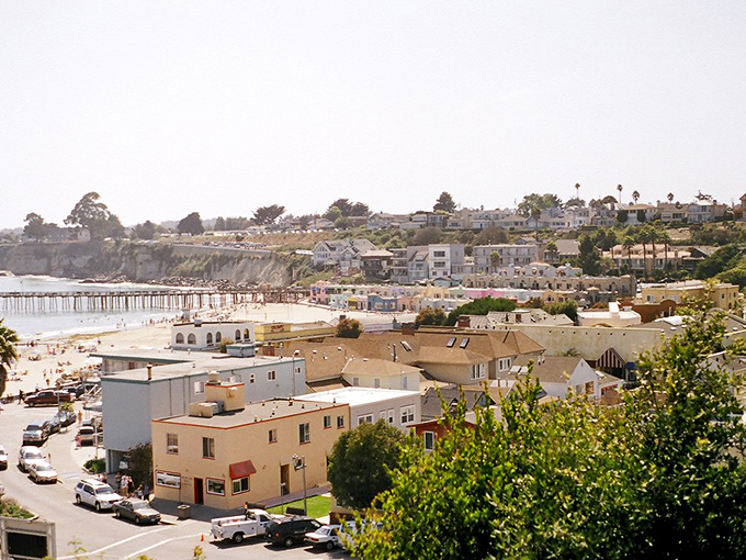Capitola's coastal charm spreads across the hillside, with the beach and pier creating a postcard-perfect scene that whispers "stay awhile."