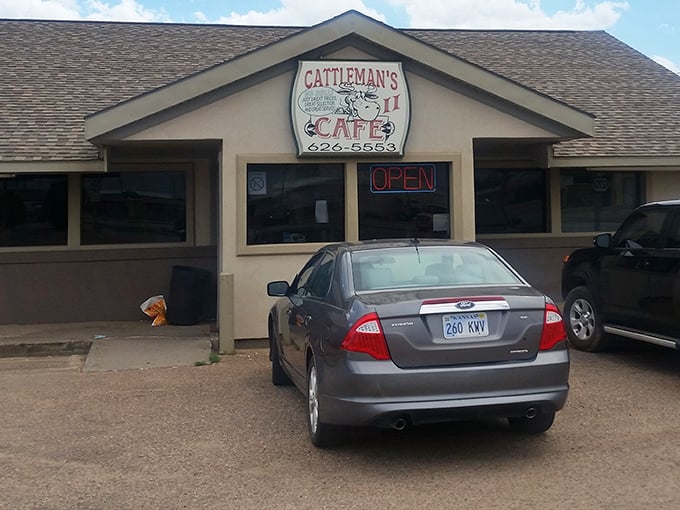 Cattleman's Cafe welcomes hungry travelers with its no-nonsense approach to great steaks. That "OPEN" sign might as well say "Carnivore Heaven."
