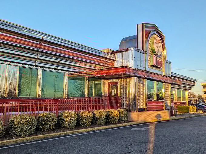 Sunset transforms this chrome diner into a Edward Hopper painting come to life. Where breakfast dreams come true at any hour.