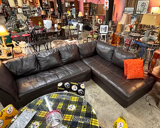 Talk about a lucky find! This comfy leather sectional and football fan's table setup is ready for game day and great conversation.