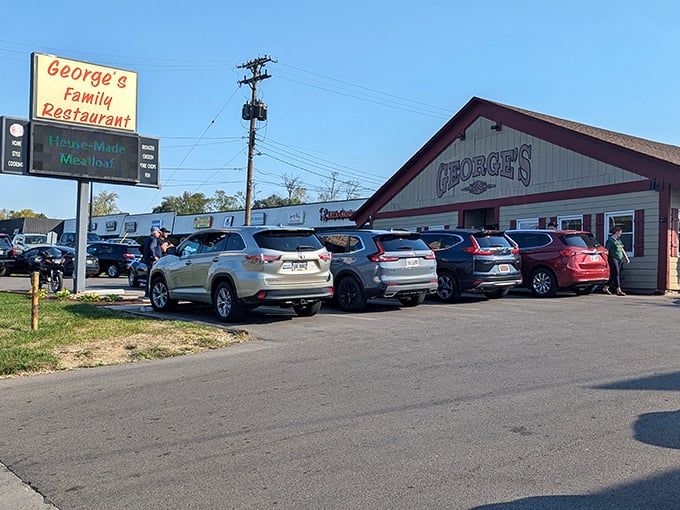 George's Family Restaurant with sign - That "Home-Made Meatloaf" sign isn't just advertising&mdash;it's a promise. Cars fill the lot because some promises are worth waiting for.
