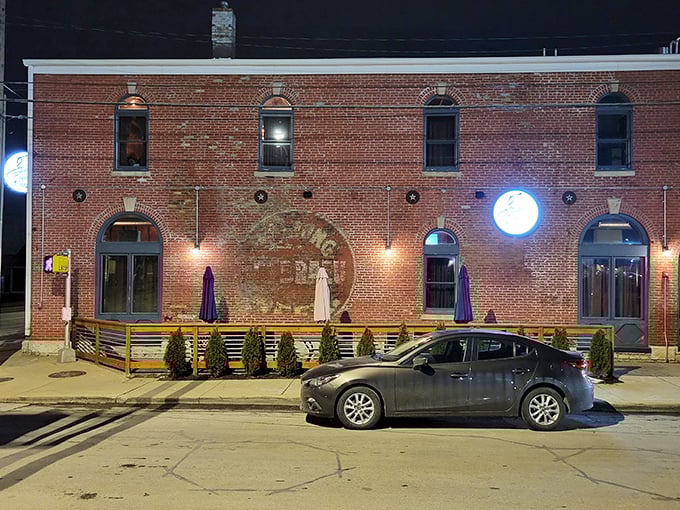 Evening lights transform this historic spot into pure magic where exceptional beef meets old-world charm every single night.