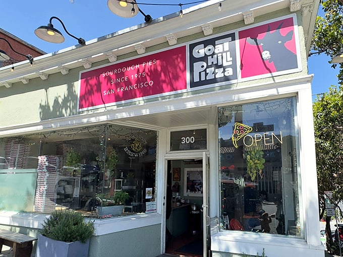 Sunlight dances across Goat Hill Pizza's charming facade, where San Francisco's sourdough tradition meets pizza magic in Potrero Hill.