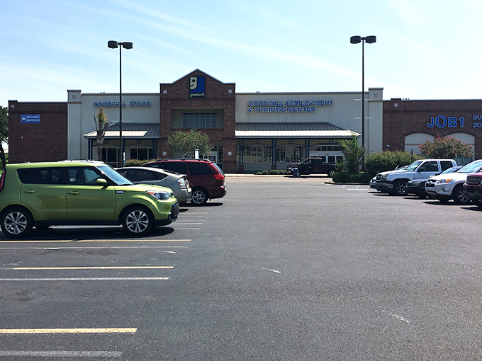 Sprawling like a secondhand department store, this Goodwill's parking lot hints at the adventures waiting inside those doors.